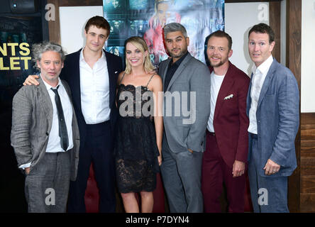 Max Irons, Margot Robbie and Simon Pegg arrive for a screening of ...