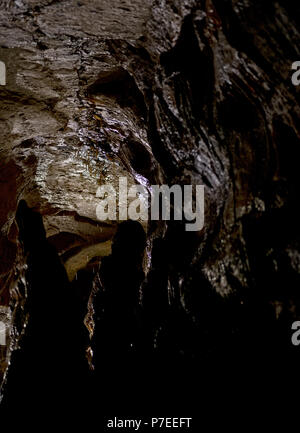 Sheets of flowstone covering the walls of the cave of the Mounds, a ...