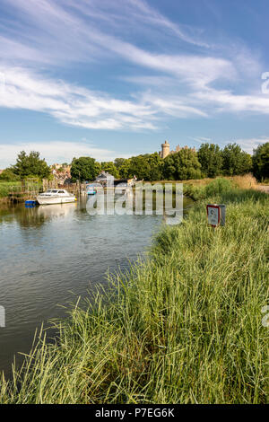 The River Arun with Arundel Castle just visible in the middle ...