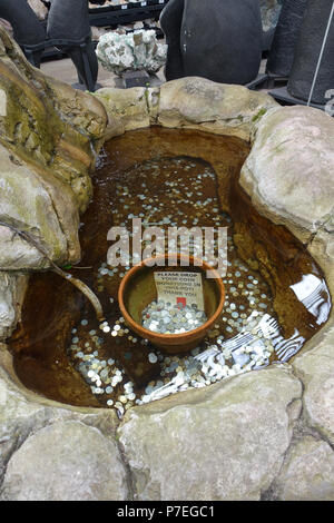 Wishing well pond with silver coins underwater Stock Photo: 92948630 ...