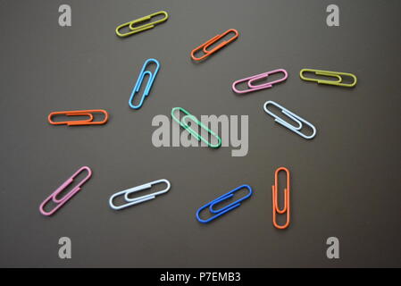 Color clips of different colors are scattered and multicolored clips ...