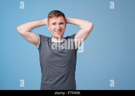 Suspicious middle aged european man looks doubtfully, being indecisive ...