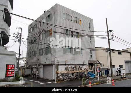 Tokyo, Japan. 6th July, 2018. Police officers stand at the entrance of ...
