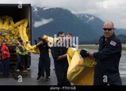 Oil pollution containment boom deployment exercise at Weymouth Harbour ...