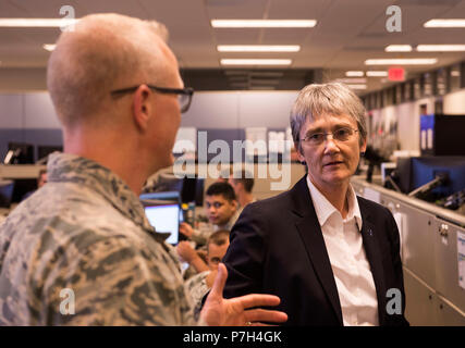 Maj. Gen. Chris Weggeman, Air Forces Cyber commander, congratulates Col ...