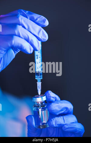 draw up the syringe Stock Photo - Alamy