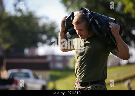 U.S. Marine Sgt. Randy Rees, conducts a Marine Corps Martial Art ...