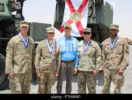 CAMP BUEHRING, Kuwait — Florida Gov. Rick Scott (right) speaks to Staff ...