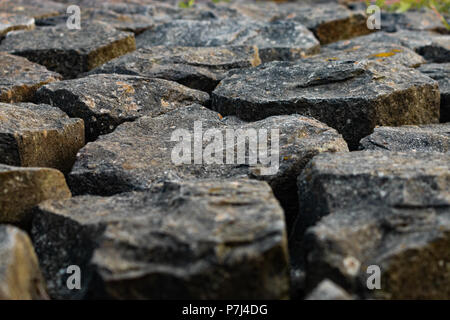 man made stones rocks shaped like bricks close up of rock stone or ...