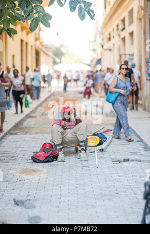 Construction worker in Havana Cuba working on the restoration of the ...