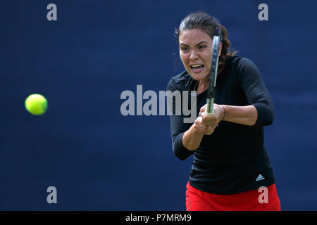 Elena-Gabriela Ruse, of Romania, plays a shot to Emma Raducanu, of the ...