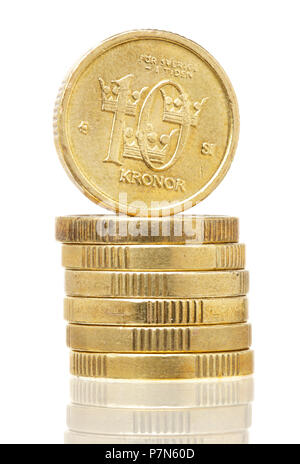 Stack of golden coins isolated on white Stock Photo - Alamy