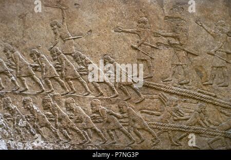 Prisoners of war rebuilding the city of Lachish. Palace of Sennacherib ...