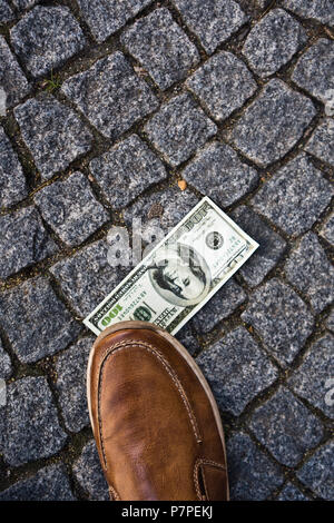 finding a dollar banknote in the street Stock Photo - Alamy
