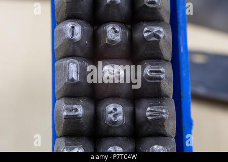 Metal stamps for stamping numbers and letters in metal. Embossed ...