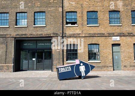 Toilets sign showing man symbol Granary Square Kings Cross London ...