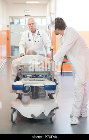 transporting a patient to surgery Stock Photo - Alamy