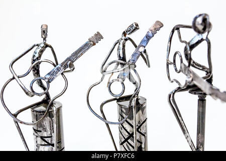 Figures of music performers made with welded black metal wire. Guitar ...