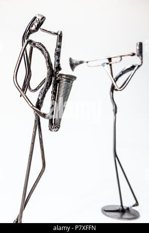 Sculpture of figures playing musical instruments, outside the Perlan ...