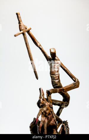 Knight Saint George is waving with his sword as he killing the dragon ...