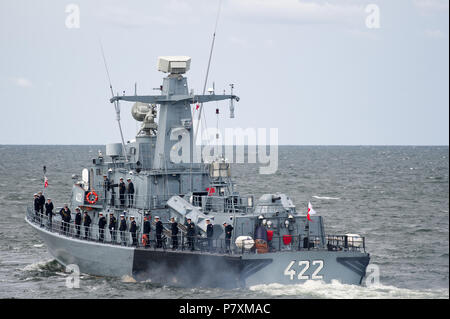 A Polish an Orkan class fast attack craft ORP Grom and emergency tow ...