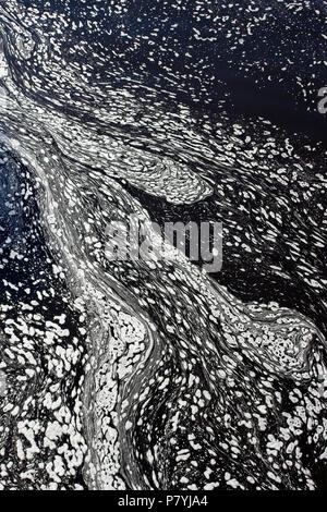 abstract patterns of foam floating on water Stock Photo - Alamy