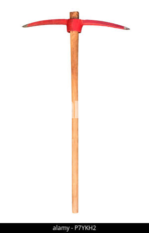 Metal pickaxe on a wooden handle on a pile of small rubble. Dirty hard ...