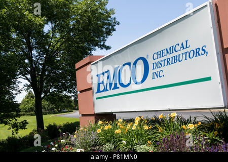 A logo sign outside of the headquarters of EMCO Chemical Distributors ...