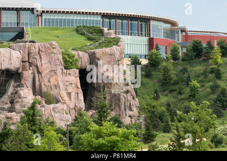 A logo sign outside of the headquarters of the Epic Systems Corporation ...