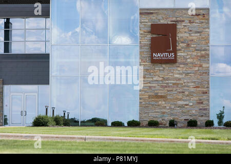 A logo sign outside of the headquarters of Navitus Health Solutions in ...