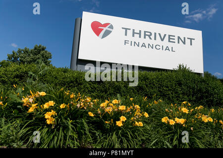 A logo sign outside of the headquarters of Thrivent Financial in ...