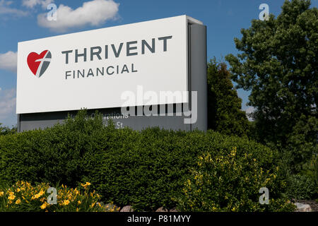 A logo sign outside of the headquarters of Thrivent Financial in ...