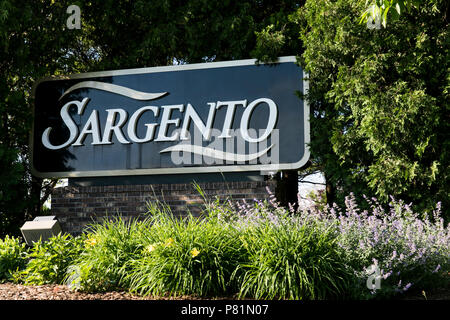 A logo sign outside of the headquarters of Sargento Foods Inc., in ...