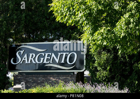 A logo sign outside of the headquarters of Sargento Foods Inc., in ...