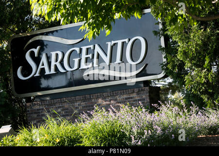 A logo sign outside of the headquarters of Sargento Foods Inc., in ...