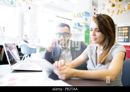 Two Sales Managers in Shop Stock Photo - Alamy