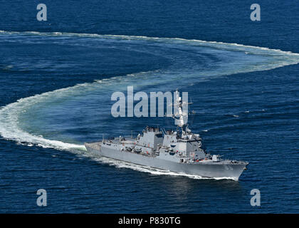 USS Shoup (DDG 86) conducts man overboard drills and training exercises ...