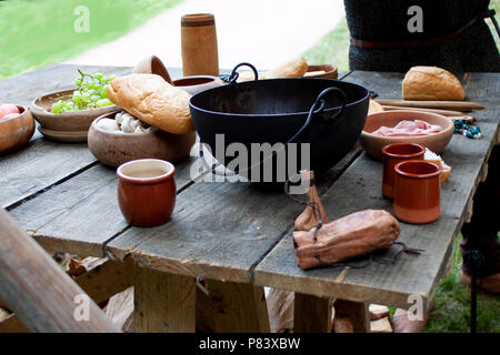 Medieval re-enactment. Wooden table of traditional English foods ...