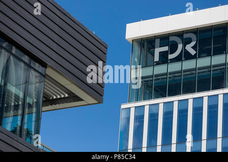 A logo sign outside of the headquarters of HDR, Inc., in Omaha ...