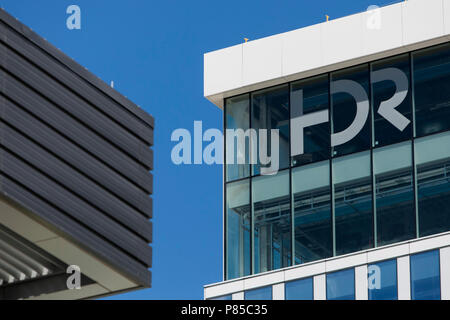 A logo sign outside of the headquarters of HDR, Inc., in Omaha ...