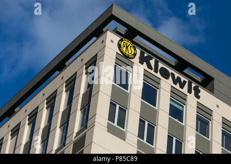 A logo sign outside of Kiewit Plaza, the headquarters of both the ...