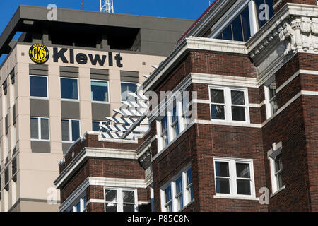 A logo sign outside of Kiewit Plaza, the headquarters of both the ...