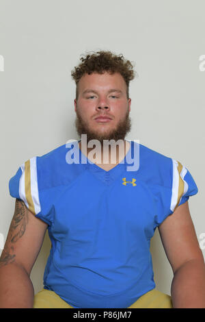 UCLA offensive lineman Andre James runs a drill at the NFL football ...