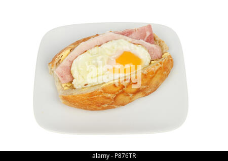 Ham and egg giraffe roll on a plate isolated against white Stock Photo ...