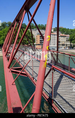 Pedestrian bridge of "L'homme de la Roche" crosses the River Saone ...