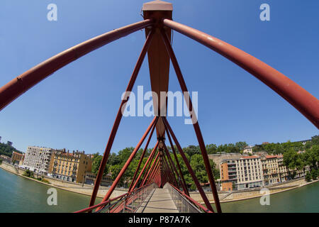 Pedestrian bridge of "L'homme de la Roche" crosses the River Saone ...