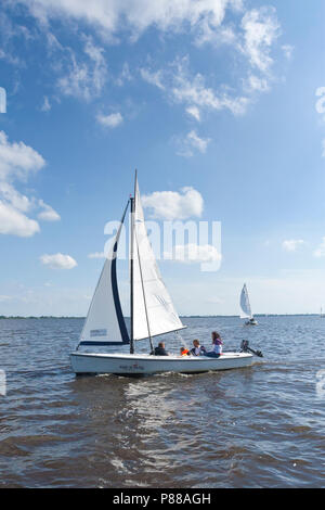 People sailing at Sneekermeer in spring Stock Photo - Alamy