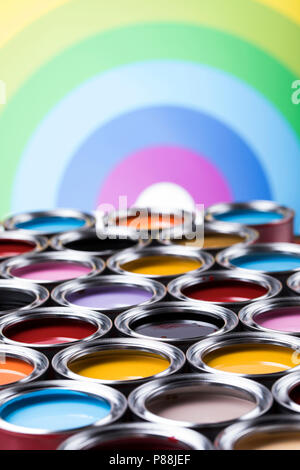 Buckets full of rainbow colored oil paint Stock Photo - Alamy