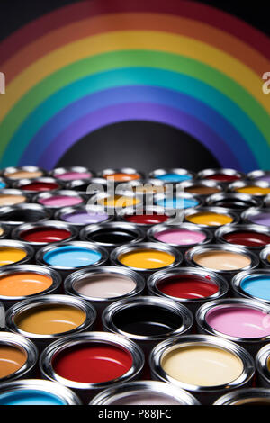 Rainbow colors, Open cans of paint Stock Photo - Alamy