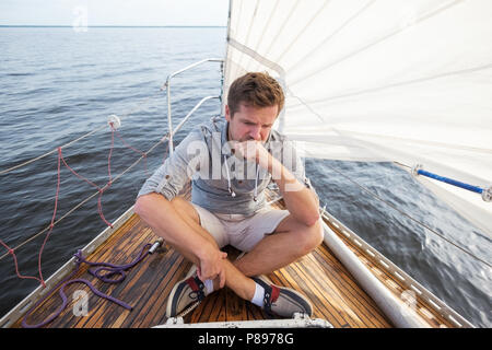 Boater Vomiting into the Sea Stock Photo: 25301330 - Alamy